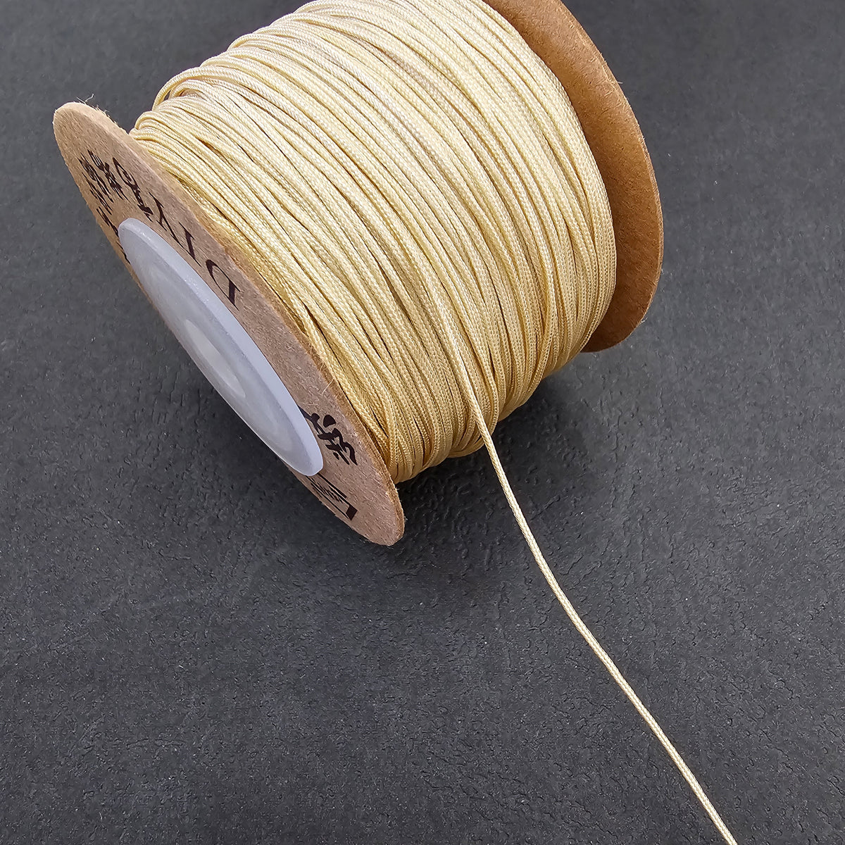 Nylon Mala Thread 0.8mm Beige 120m Roll – Aussie Bead Supply